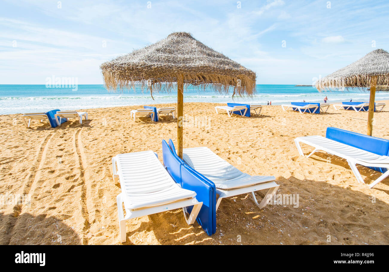 tourists at the beach in pre-season Stock Photo - Alamy