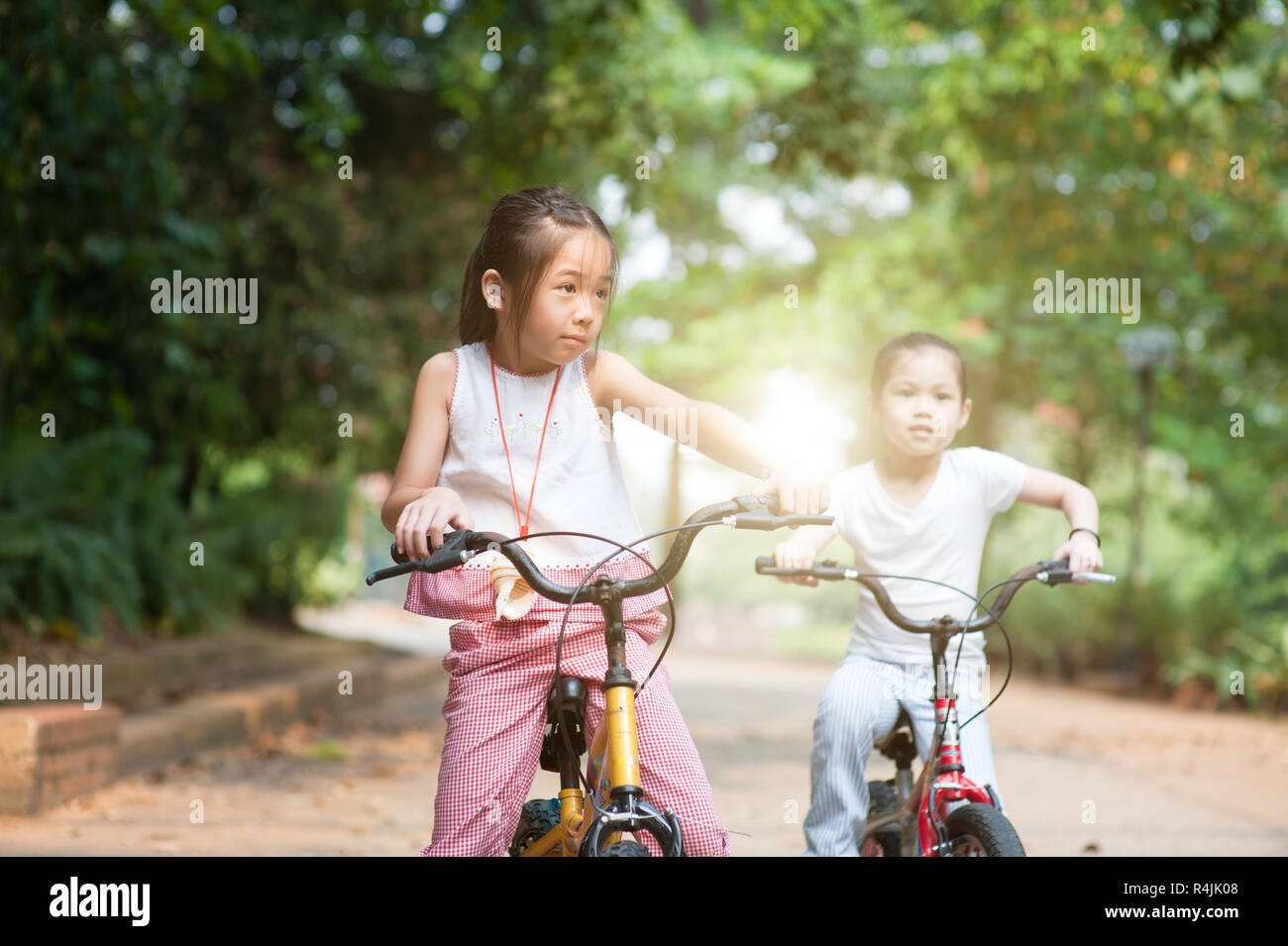 Children biking outdoor Stock Photo - Alamy