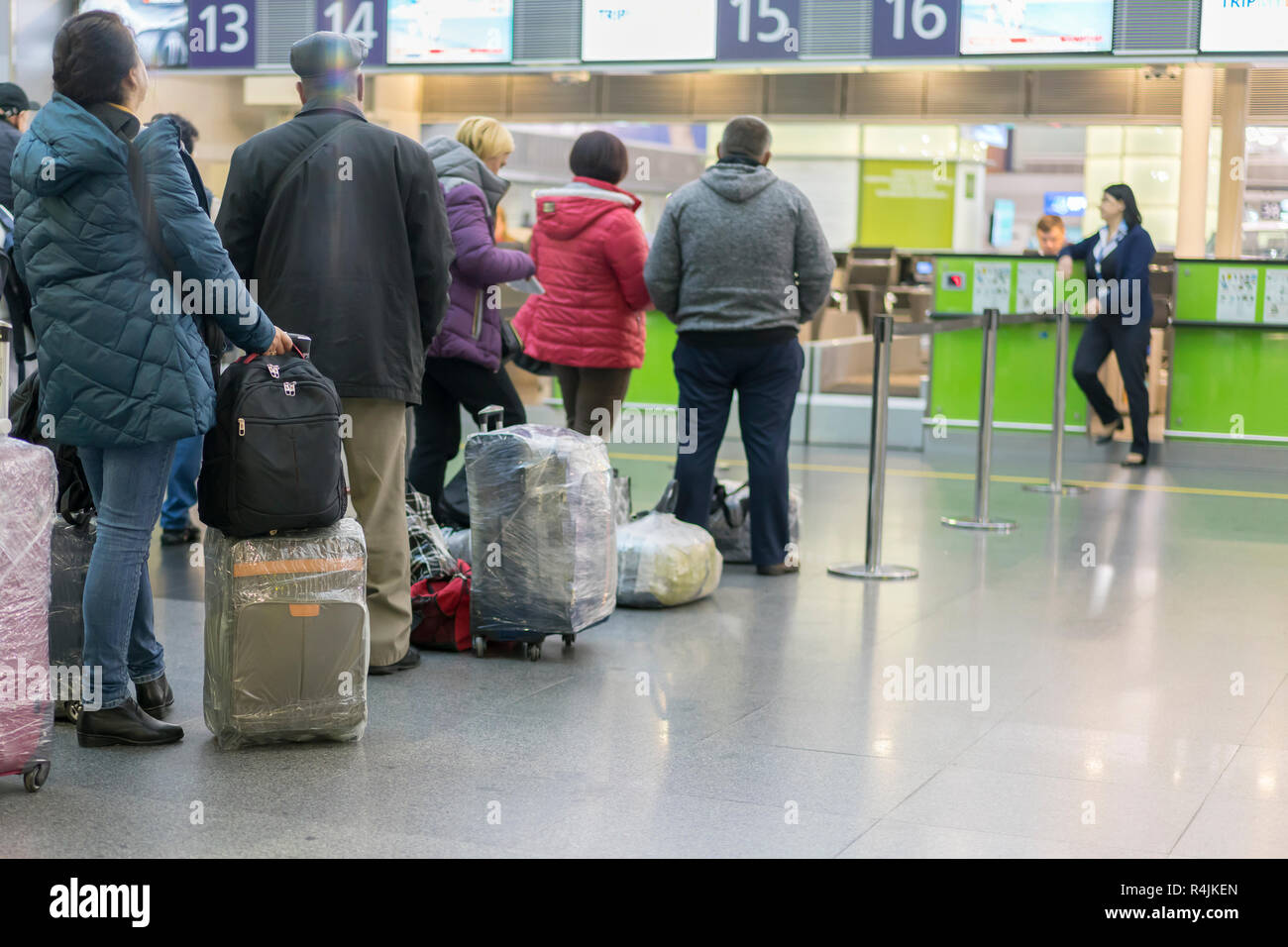 Image of passengers check in at the check-in counter at the ...