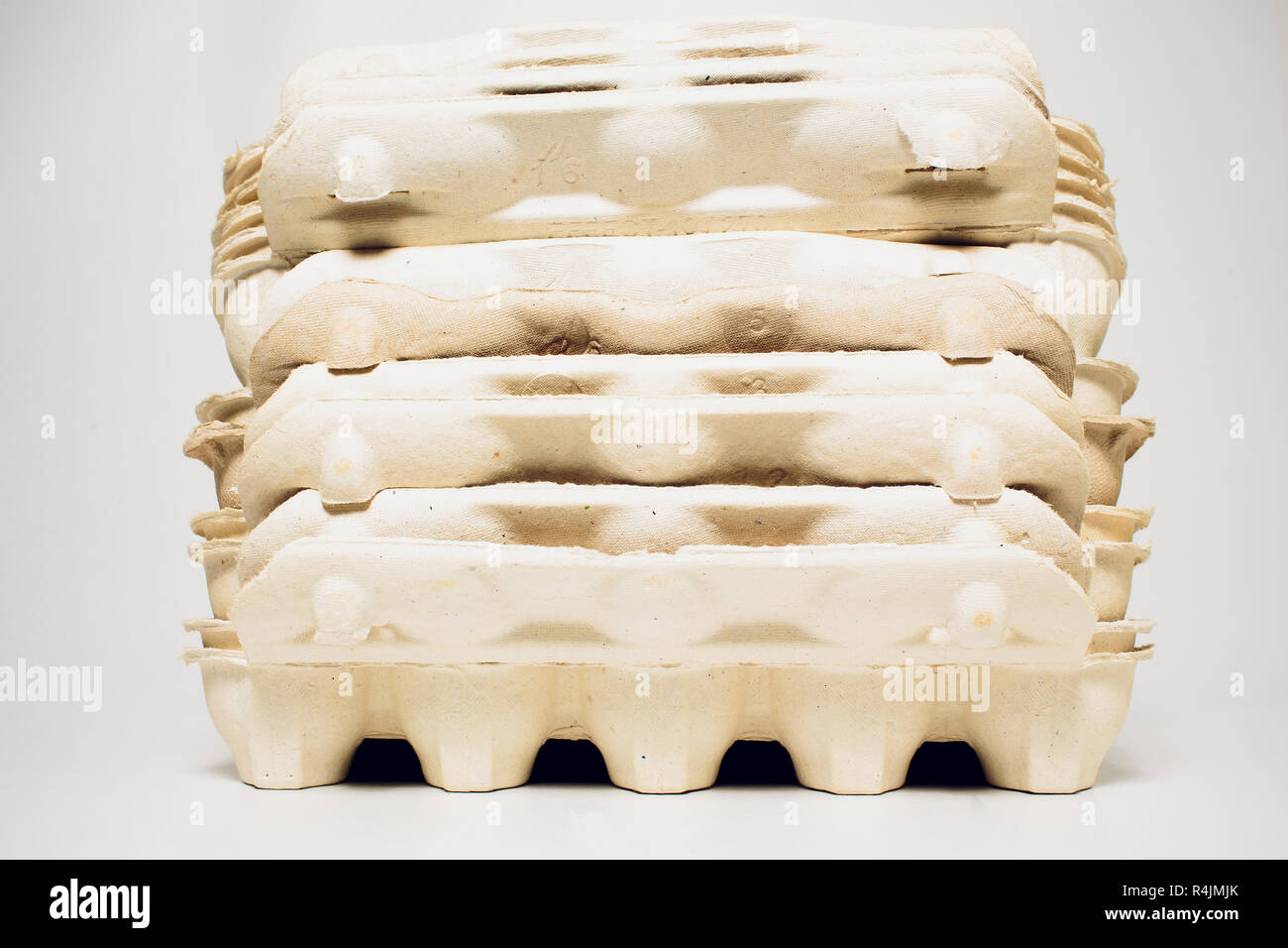 empty egg carton isolated on white rich in detail Stock Photo - Alamy