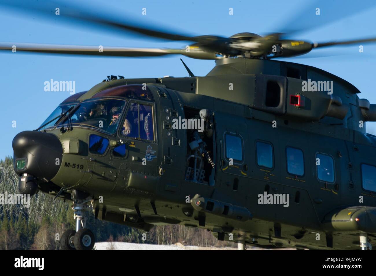 A Danish AW101-Merlin helicopter flies overt Camp Fremo during Exercise ...