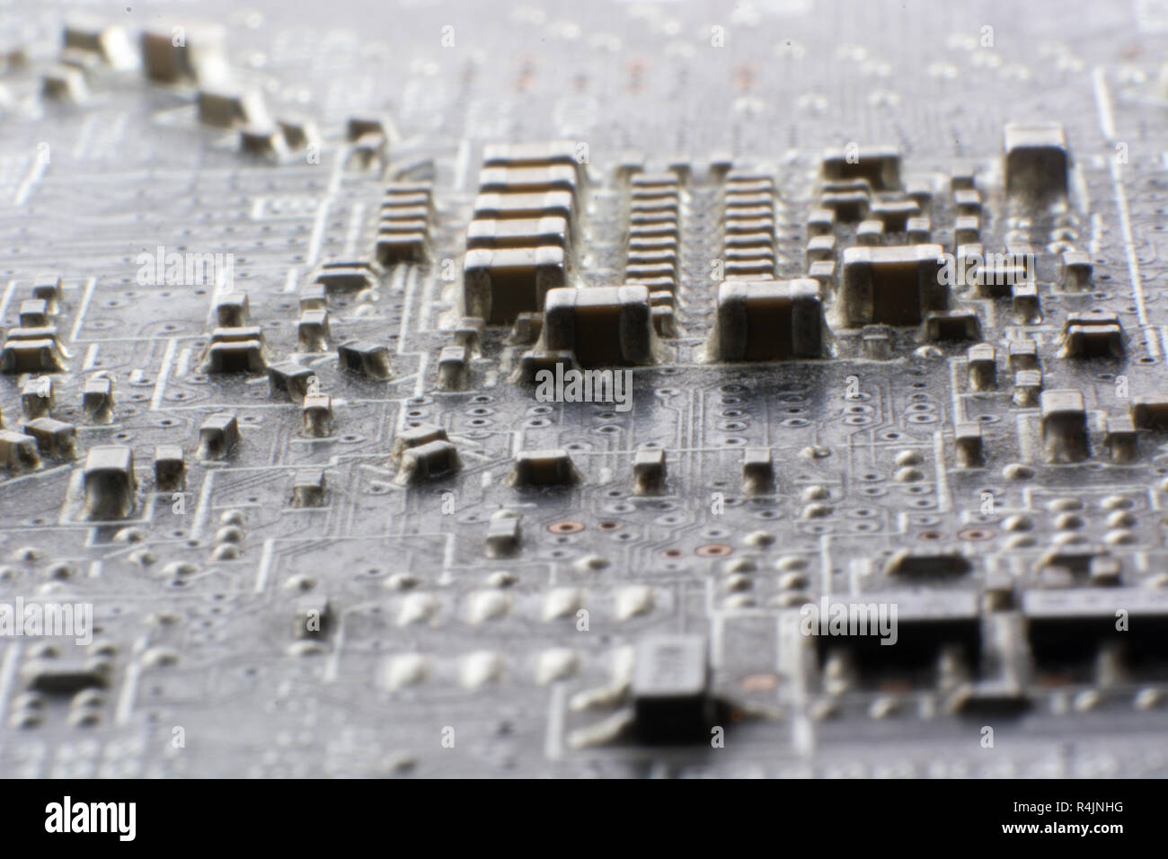 Surface-mount dusty smd components on used electronic circuit board ...