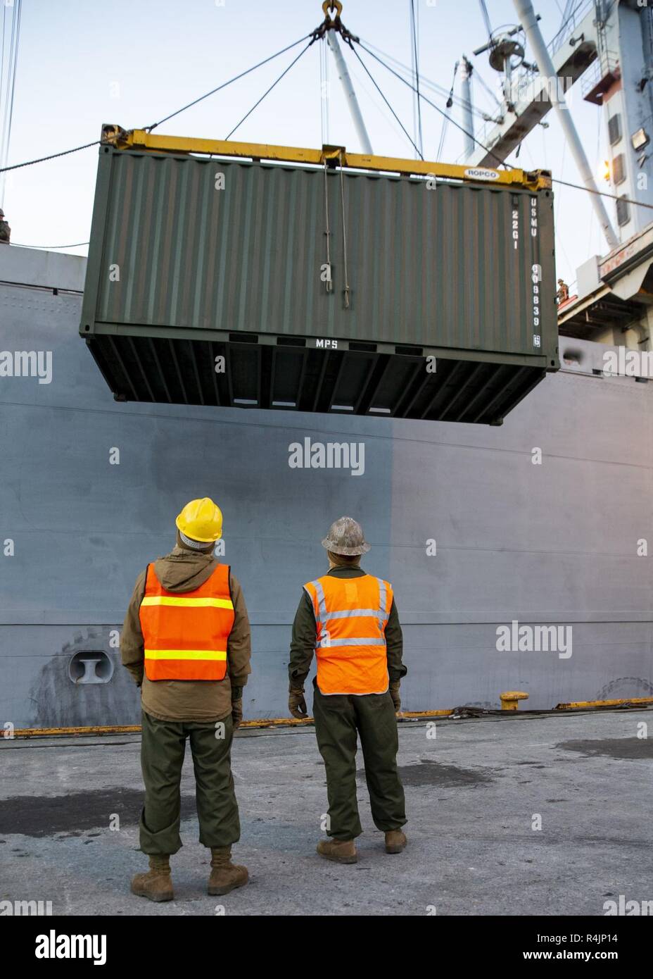 U.S. Marines assigned to 2nd Marine Aircraft Wing offload equipment ...