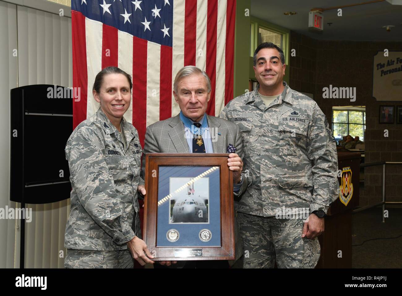 U.S. Army Capt. Paul Bucha (Ret.), a Medal of Honor recipient, recieves ...