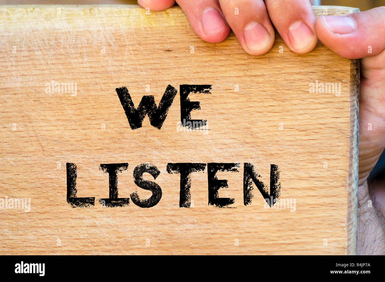 We listen text concept Stock Photo - Alamy