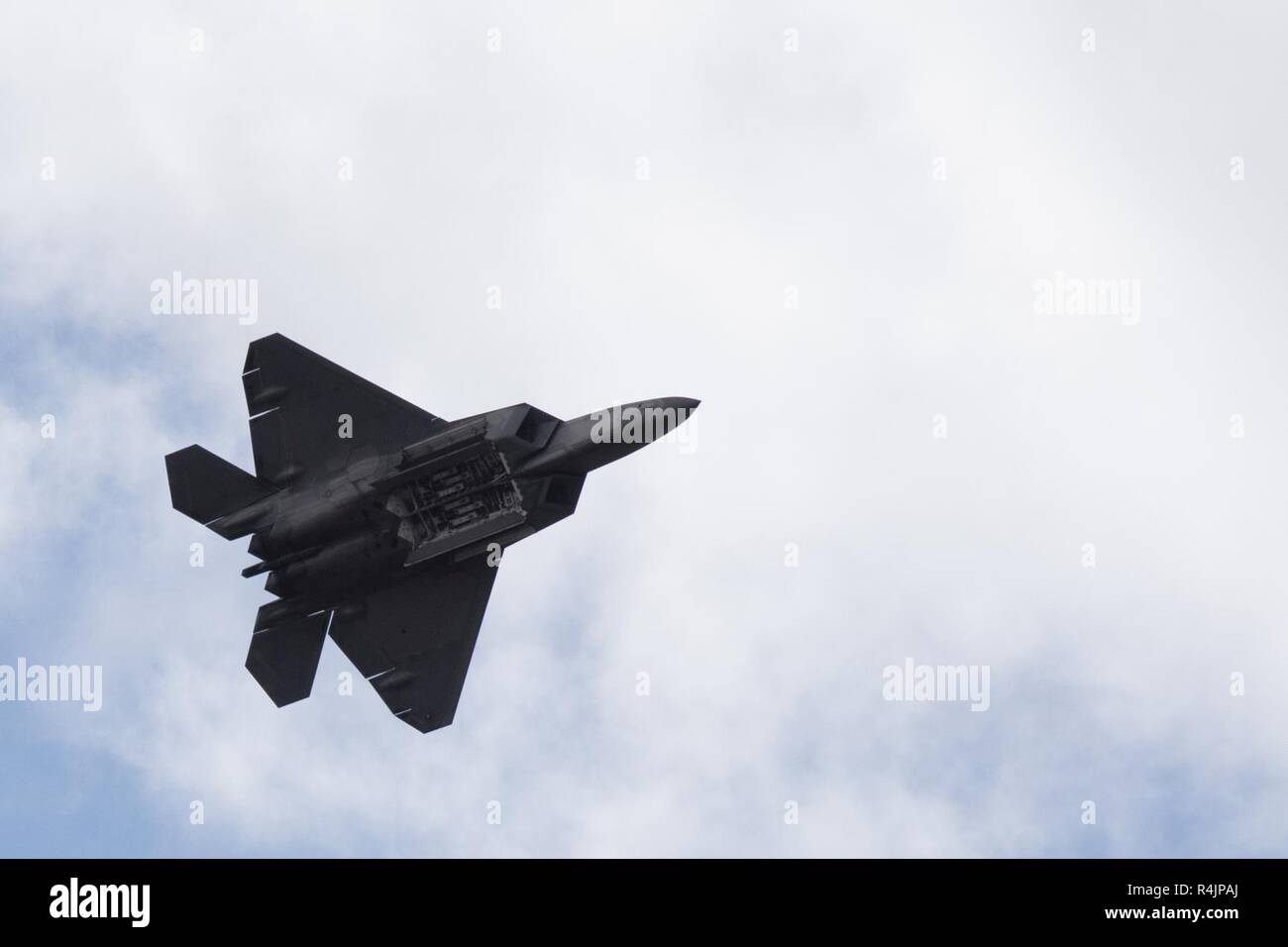 A F-22 Raptor from the Air Combat Command's Raptor Demonstration Team ...