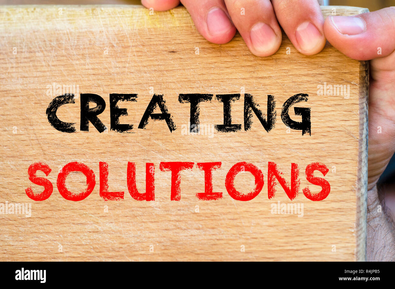 Creating solutions text concept Stock Photo - Alamy