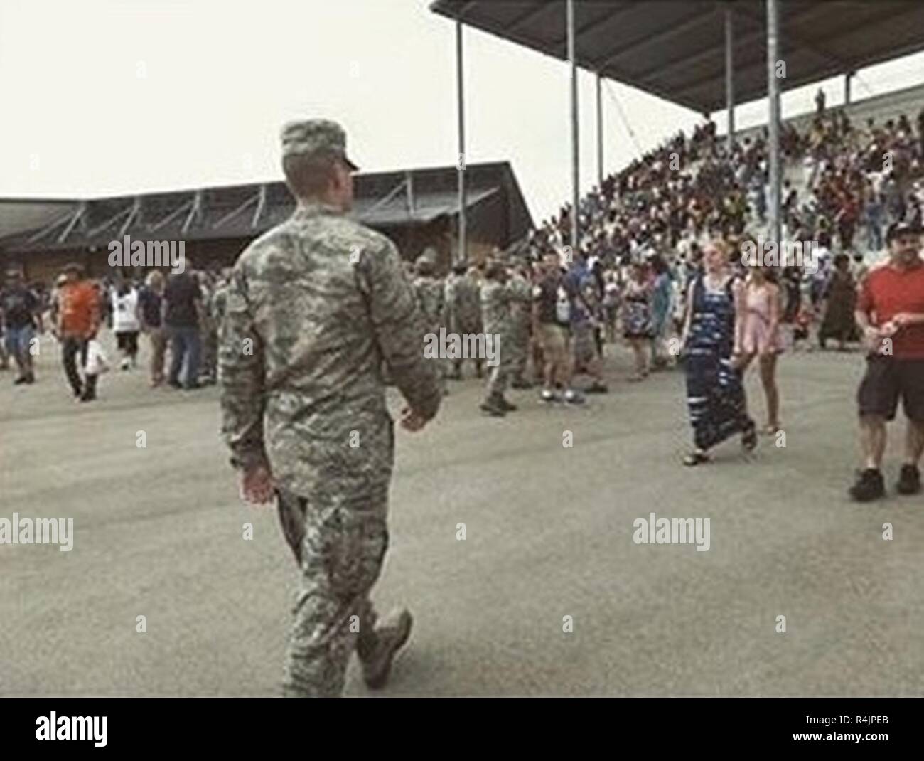 Senior Airman Cody Bushway moves towards his family after basic ...