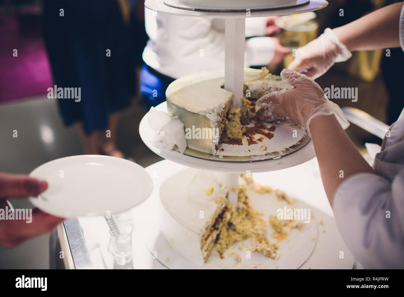 Waitress Behind Counter In Coffee Shop Cutting Slice Of Cake Stock ...