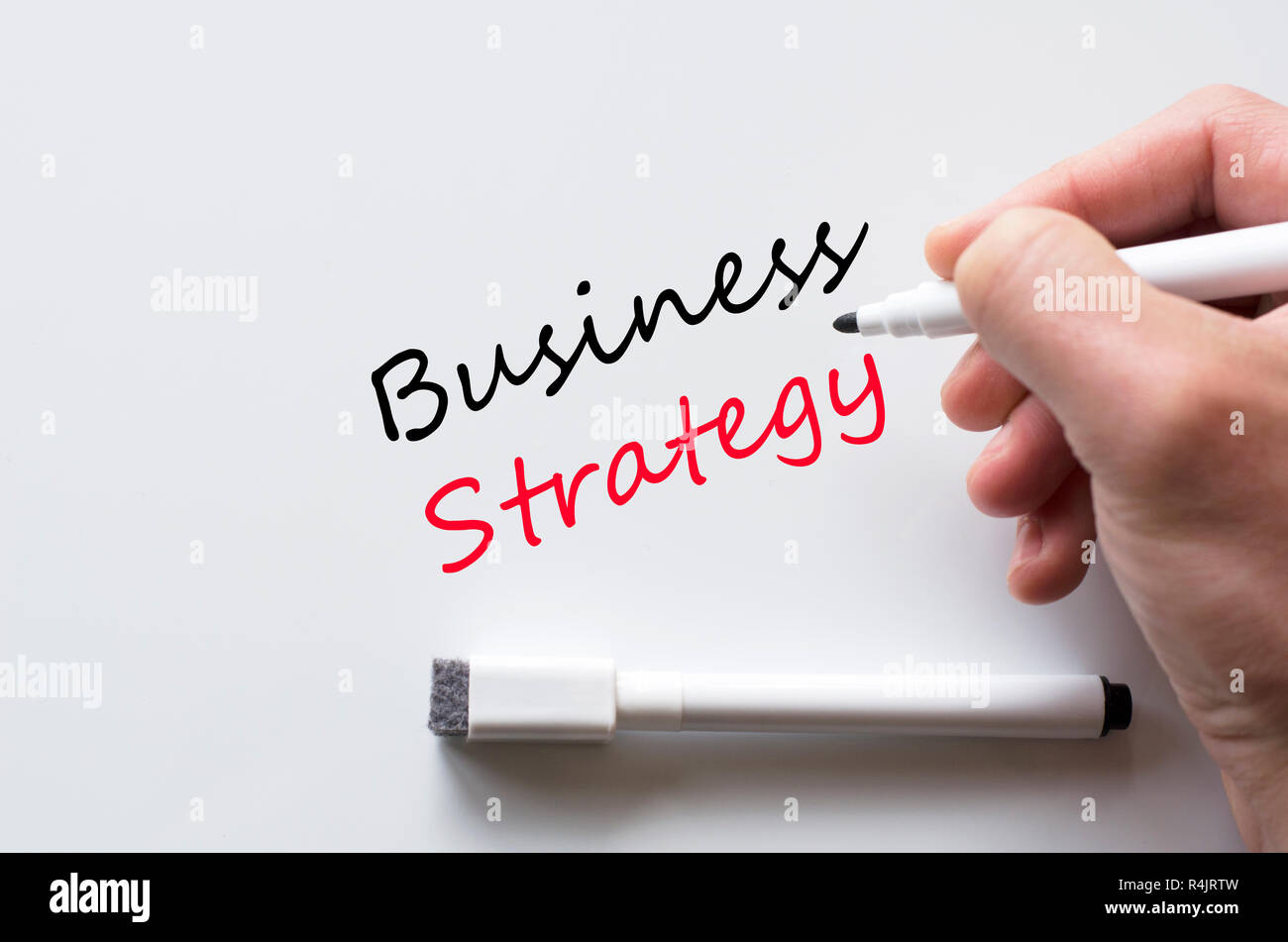 Business strategy written on whiteboard Stock Photo - Alamy
