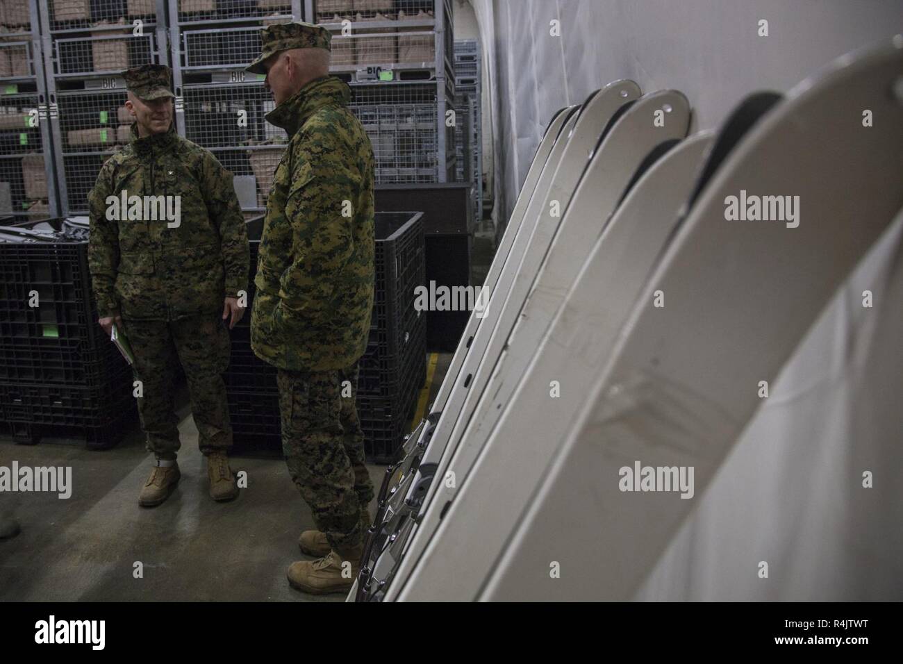 U.S. Marine Corps Lt. Gen. Mark Brilakis, center, the commander of ...