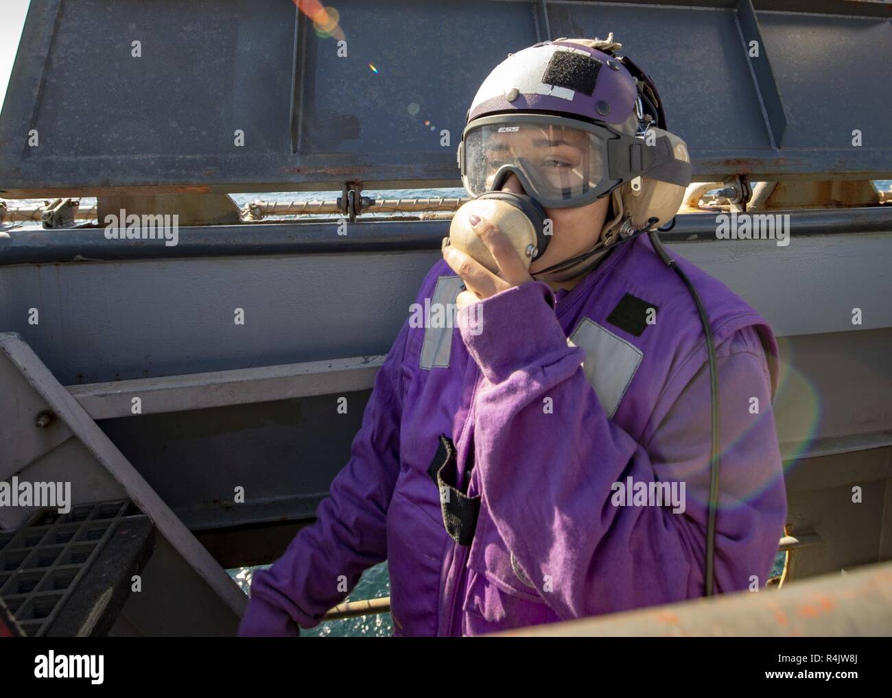 ATLANTIC OCEAN (Oct. 28, 2018) – Fireman Felicia Vasquez communicates ...