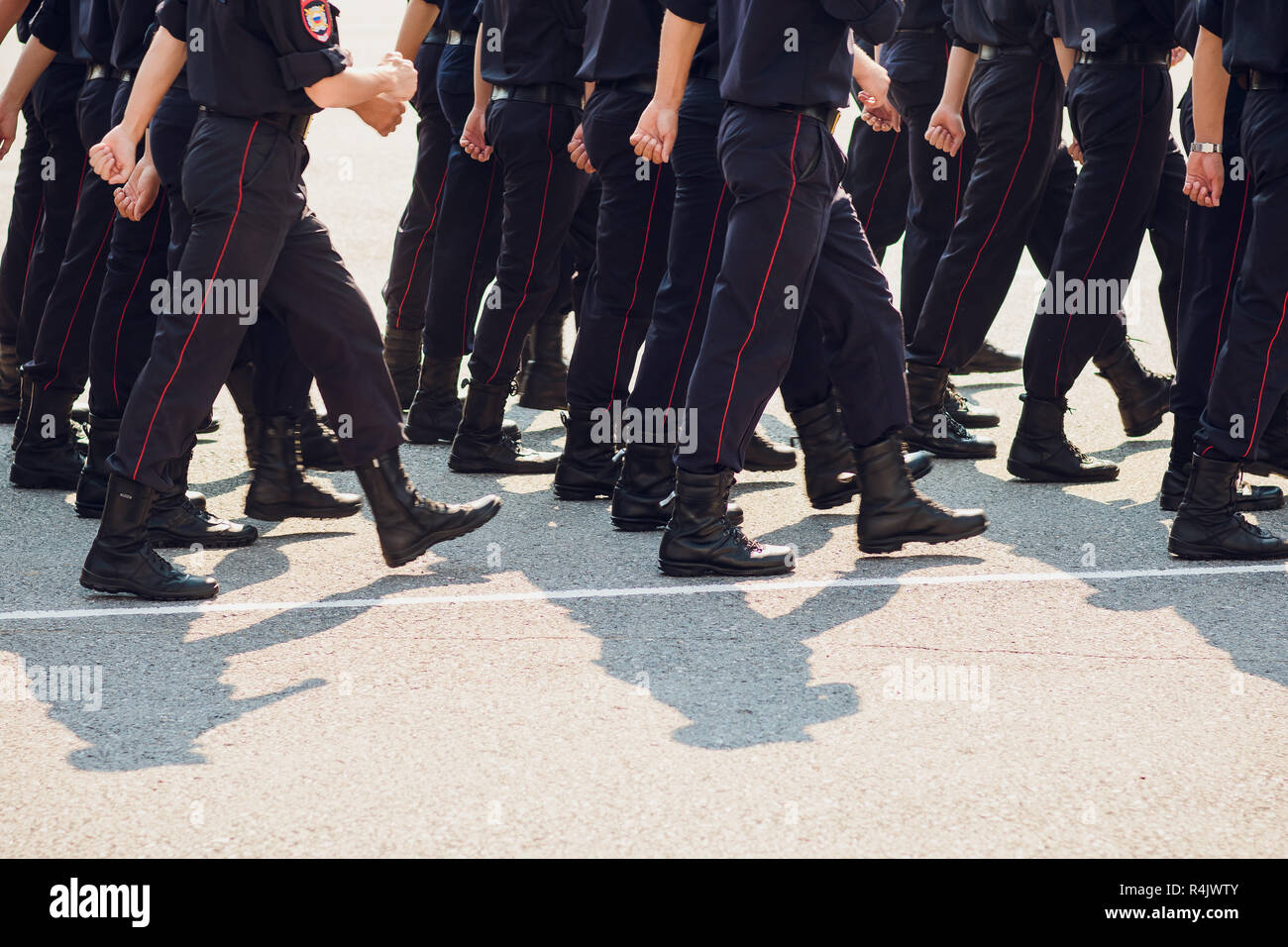 the police are marching. legs. shoes in line Stock Photo - Alamy