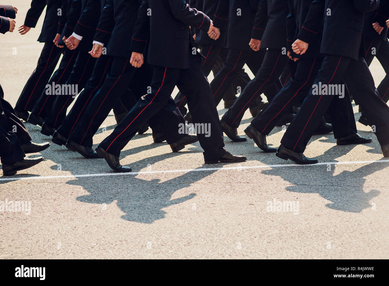 the police are marching. legs. shoes in line Stock Photo - Alamy