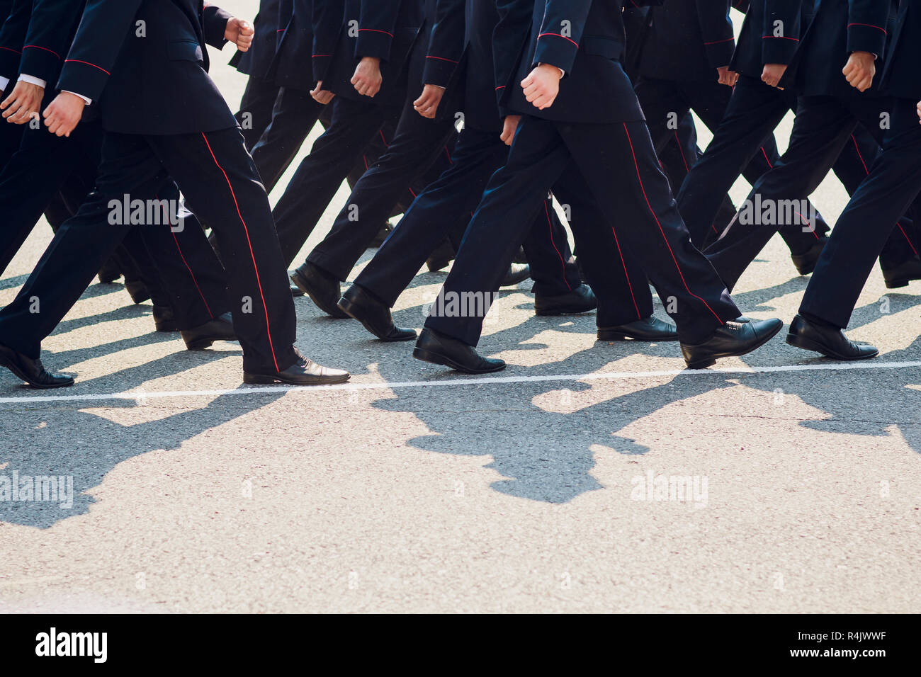 the police are marching. legs. shoes in line Stock Photo - Alamy