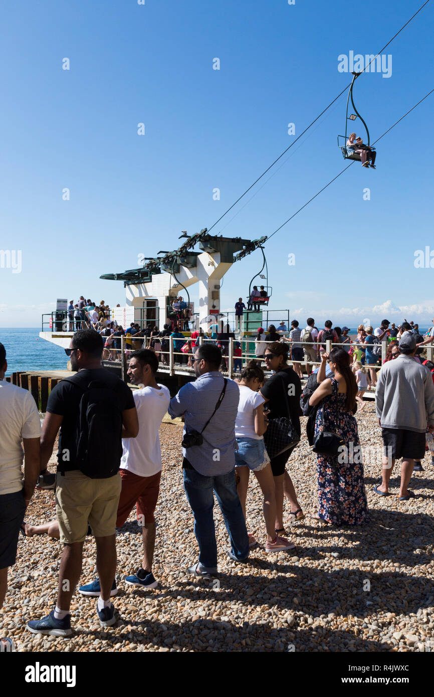 Tourists and visitors queueing / queue at the Needles Chairlift ...