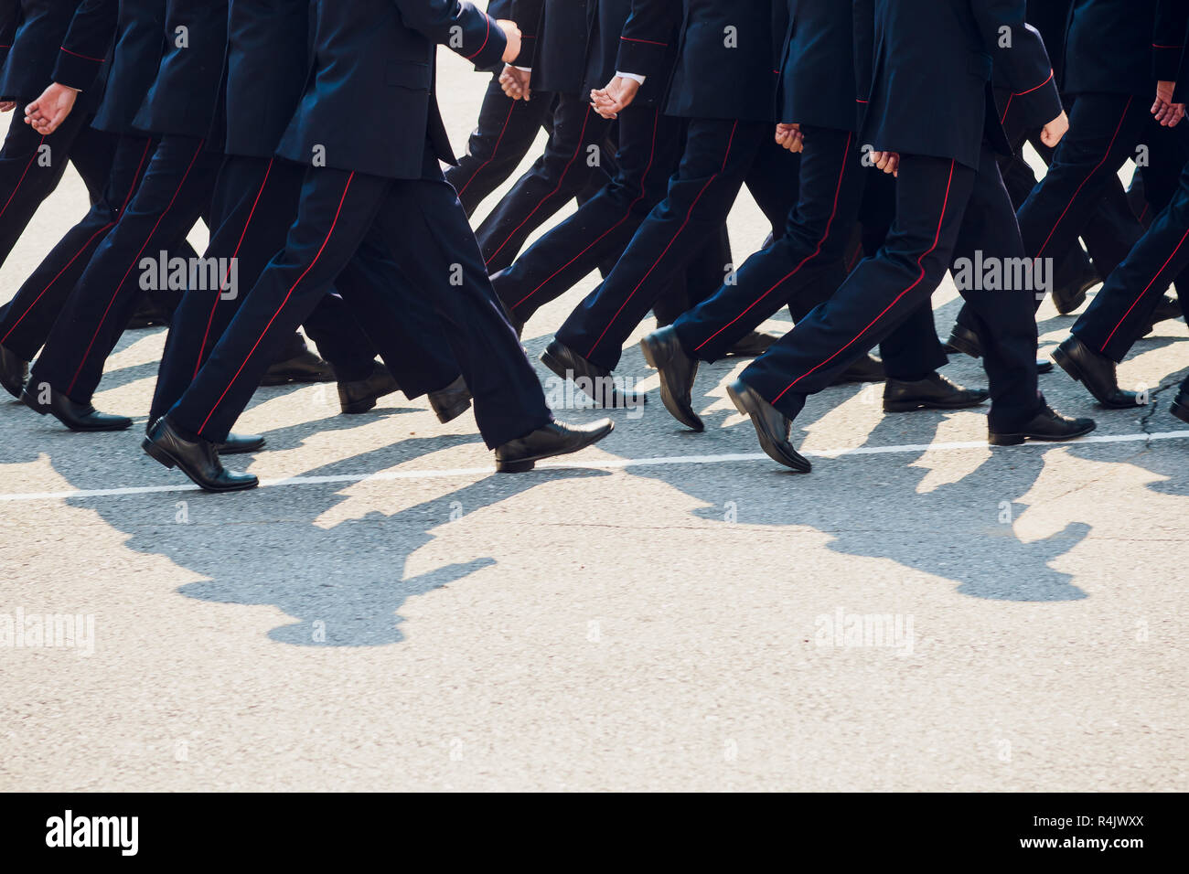 the police are marching. legs. shoes in line Stock Photo - Alamy