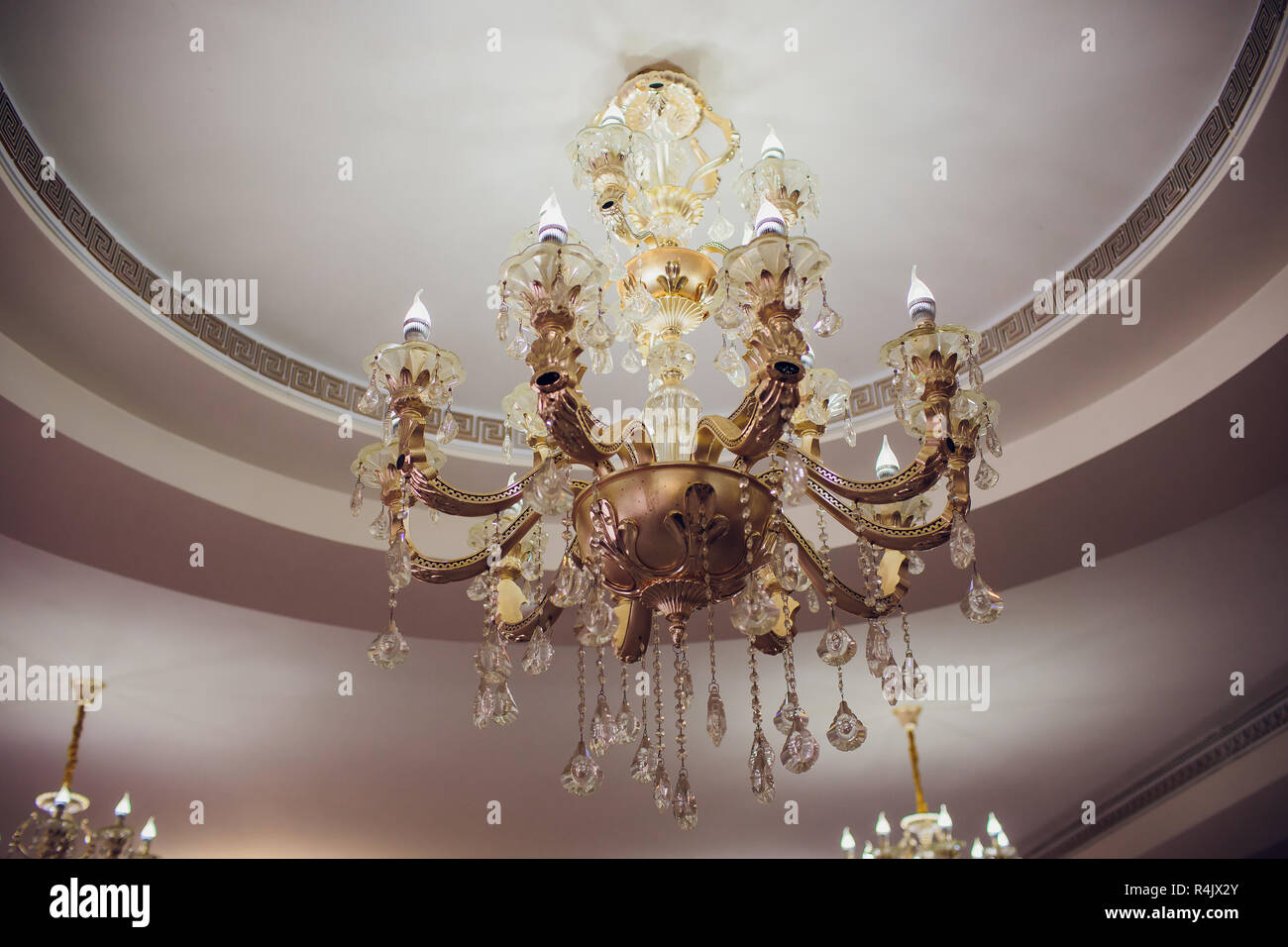 Close-up of a beautiful crystal chandelier Beautiful chandelier. luxury ...