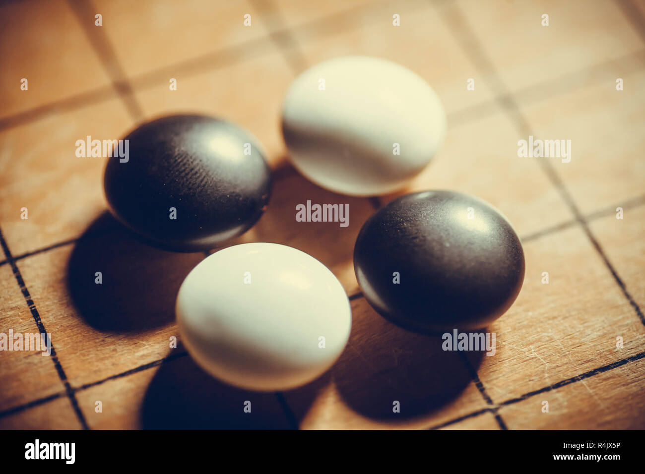 Go plays playing board game hi-res stock photography and images - Alamy
