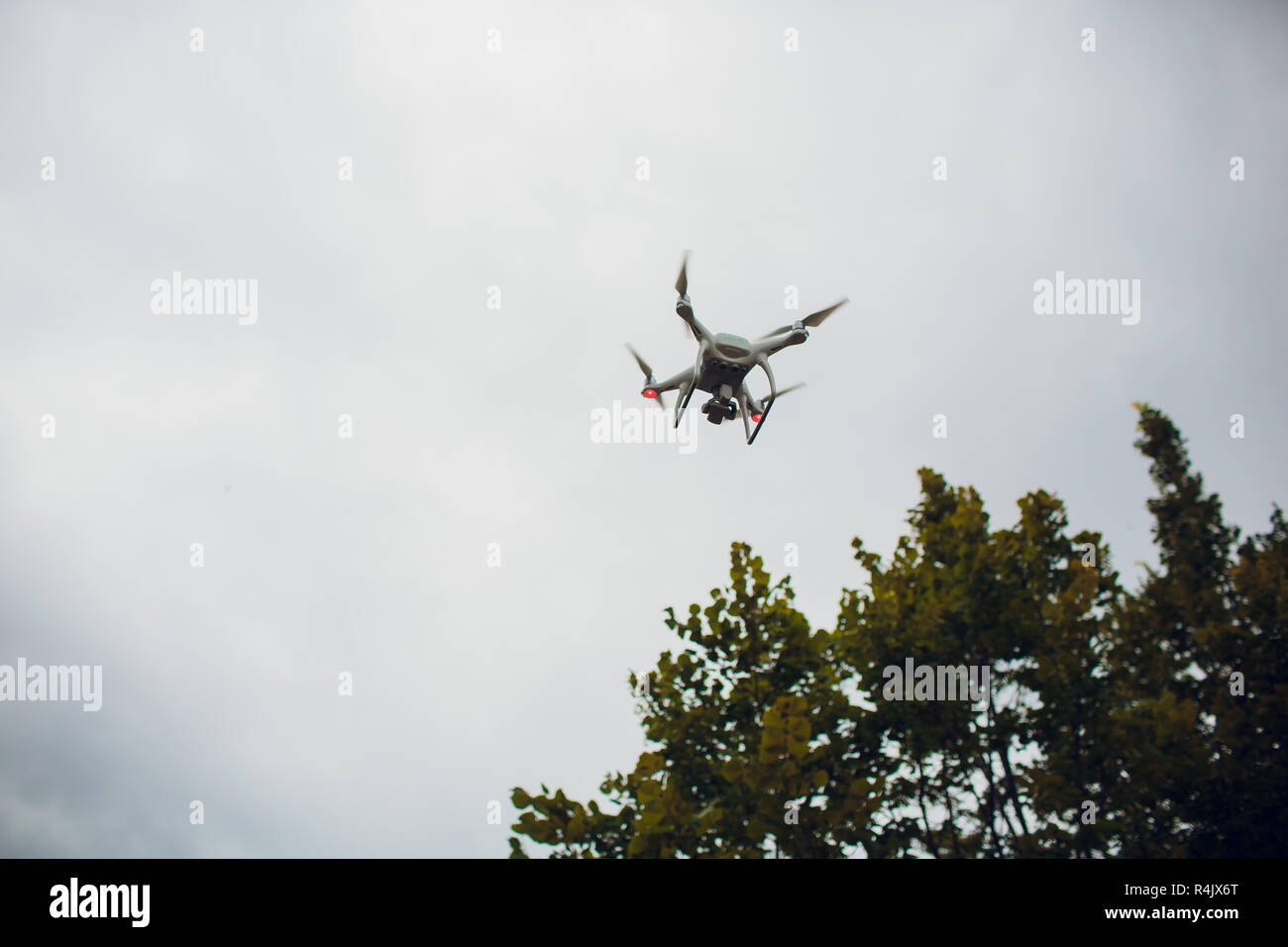 UFA, RUSSIA - 11 JULY 2018: Drone DJI Phantom 4. Quadrocopter against ...