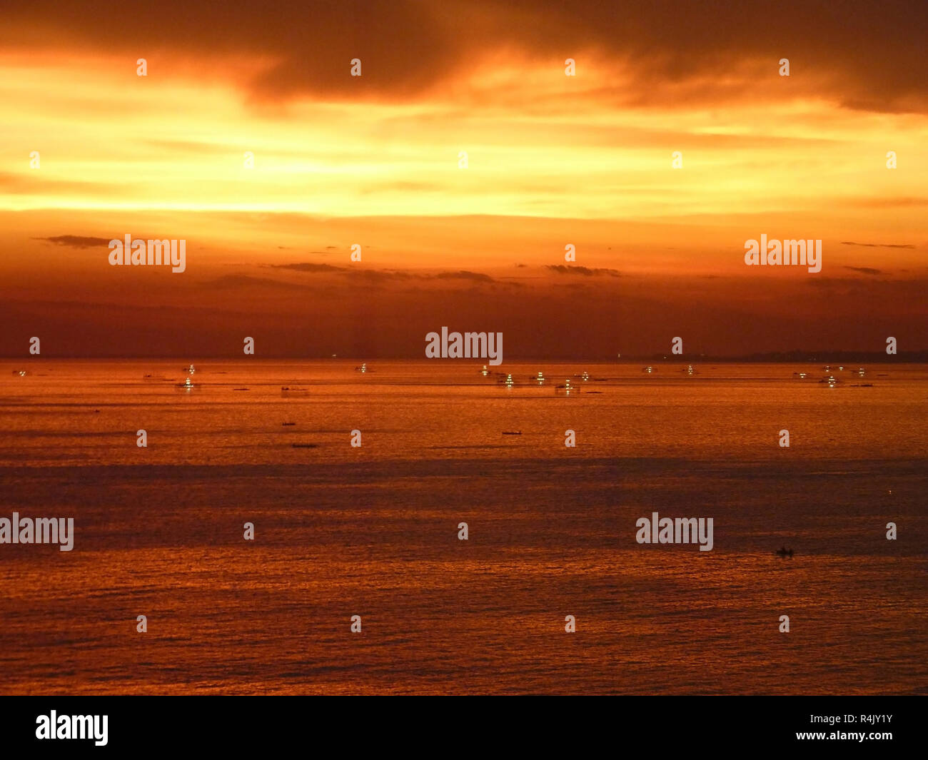 Red decline at the sea Stock Photo - Alamy
