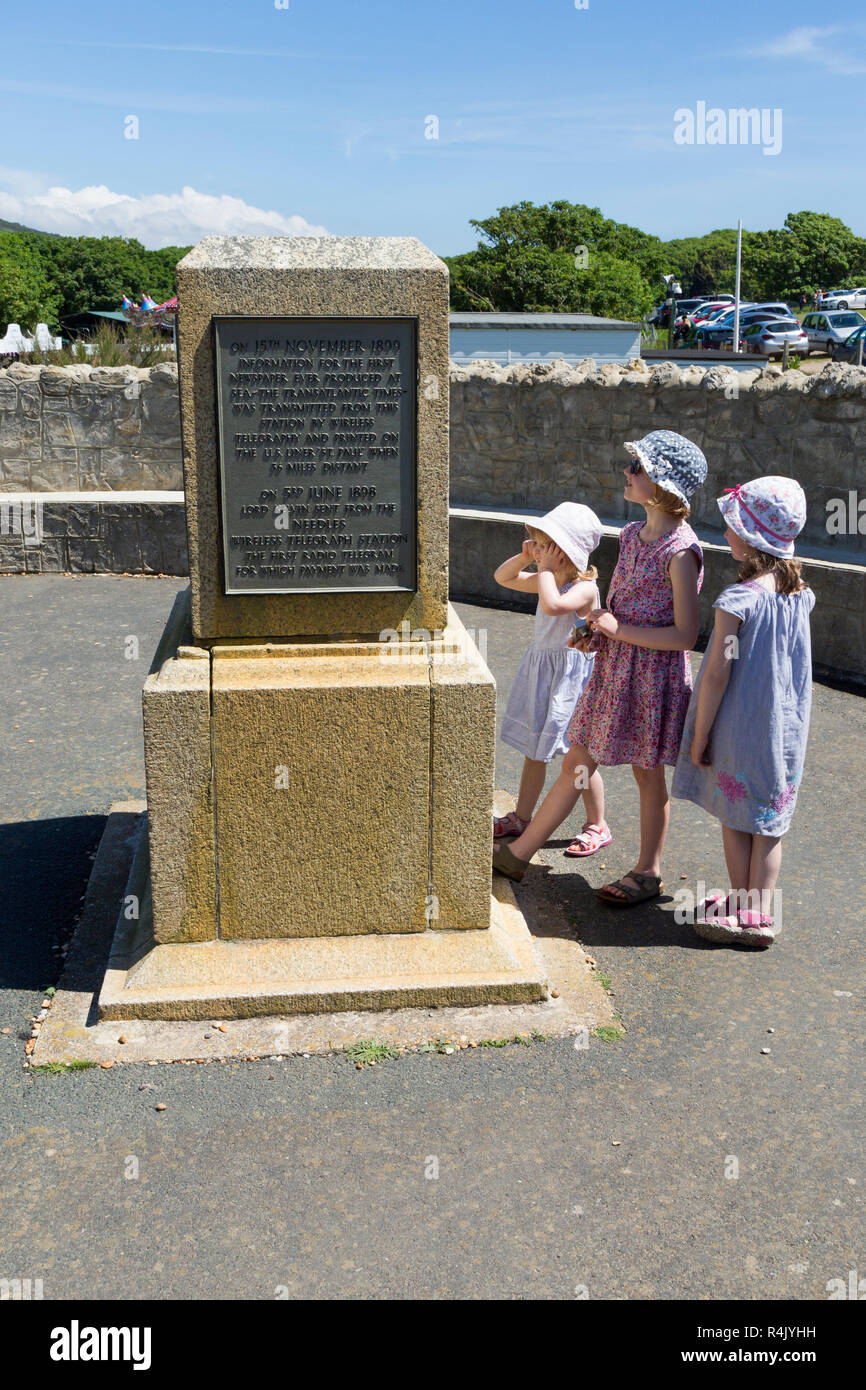 Children / kids / girls read the various plaques on The Marconi ...