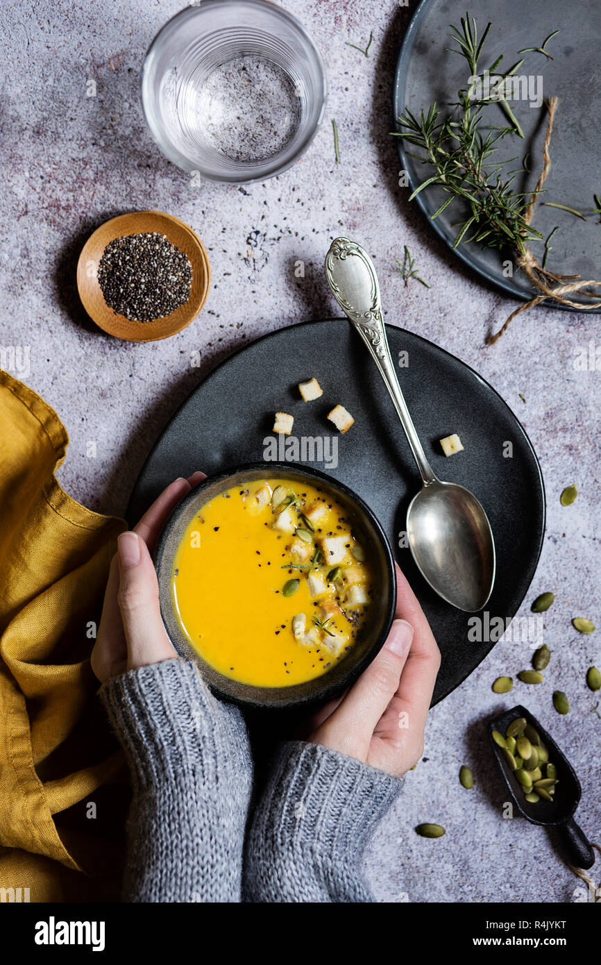 Hands holding bowl vegetable soup hi-res stock photography and images ...