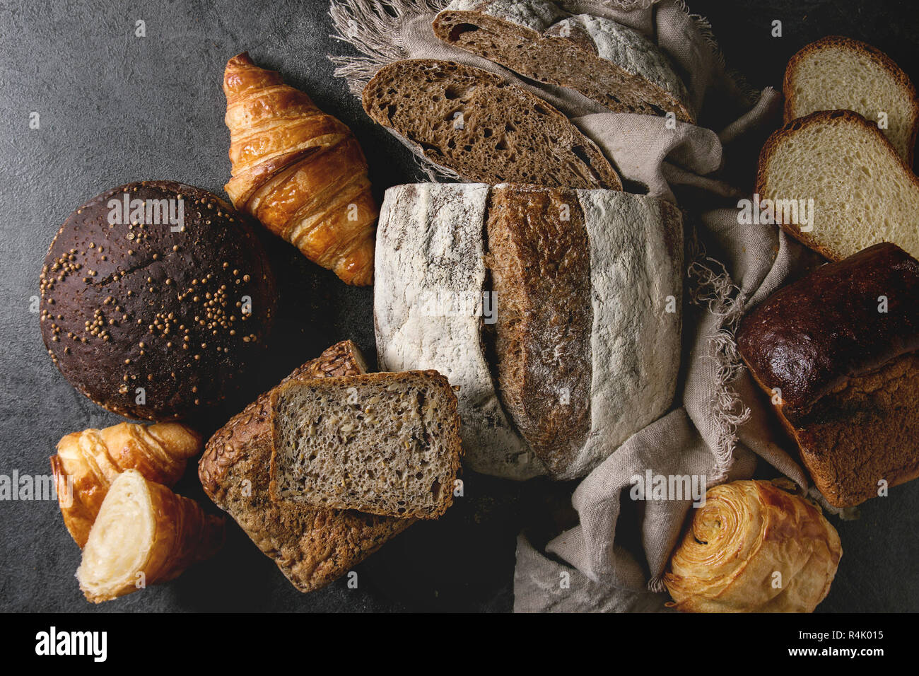 Variety of fresh baked rye, spelled, wheat craft artisan bread, whole ...