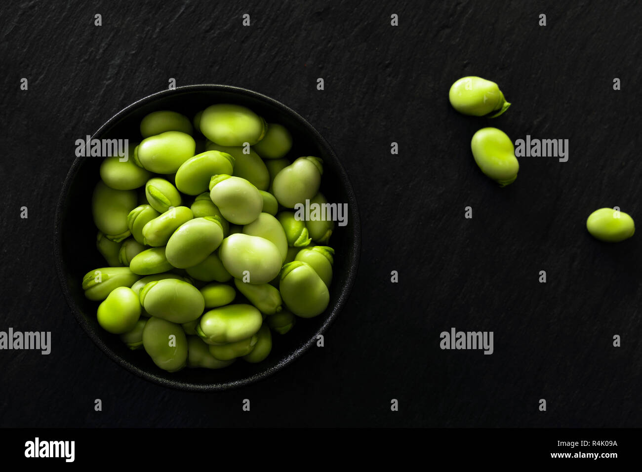 A bowl of raw fava beans Stock Photo - Alamy