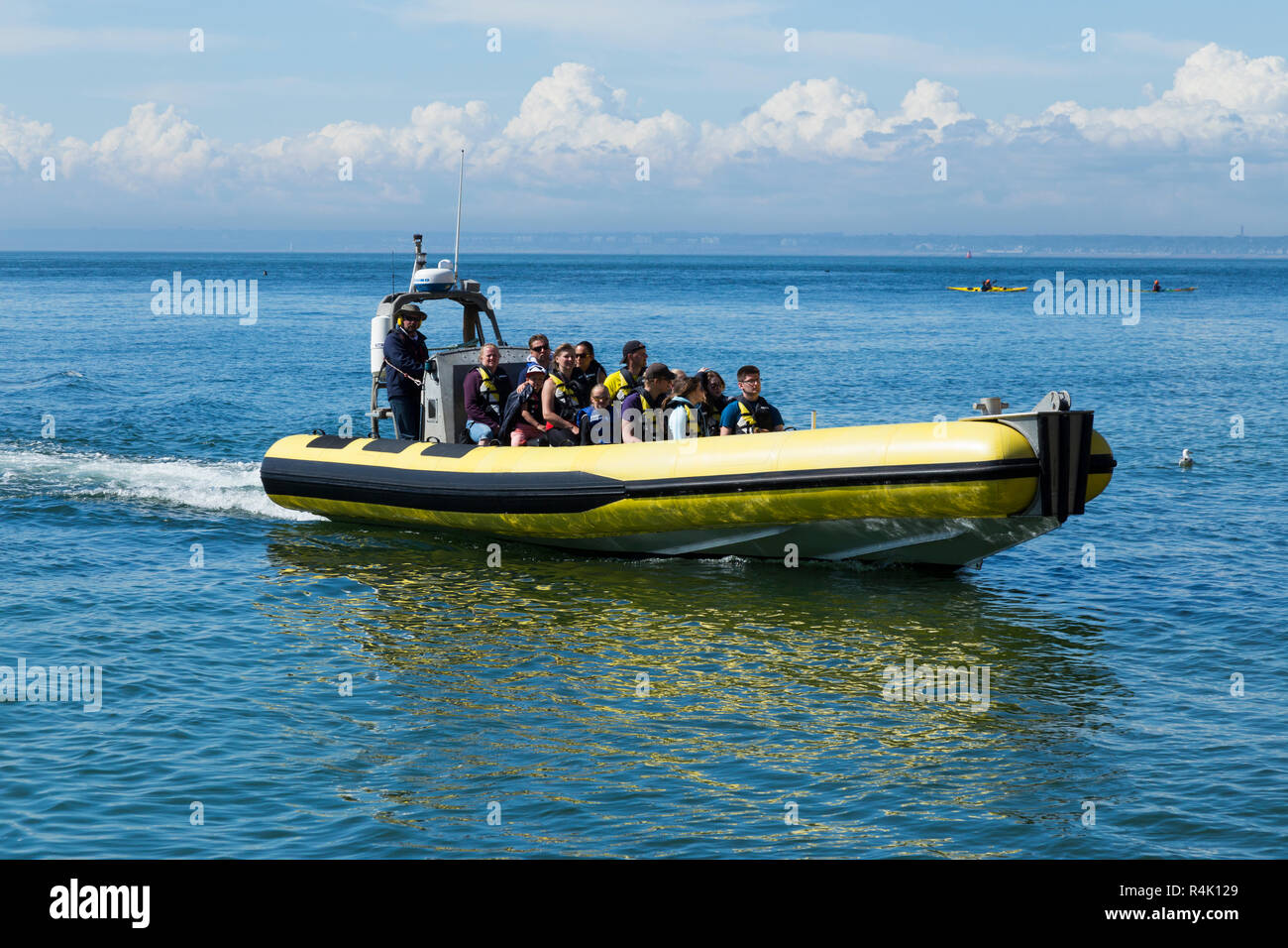 Tourist sightseeing boats for tourists, in Alum Bay. Fast boat takes ...