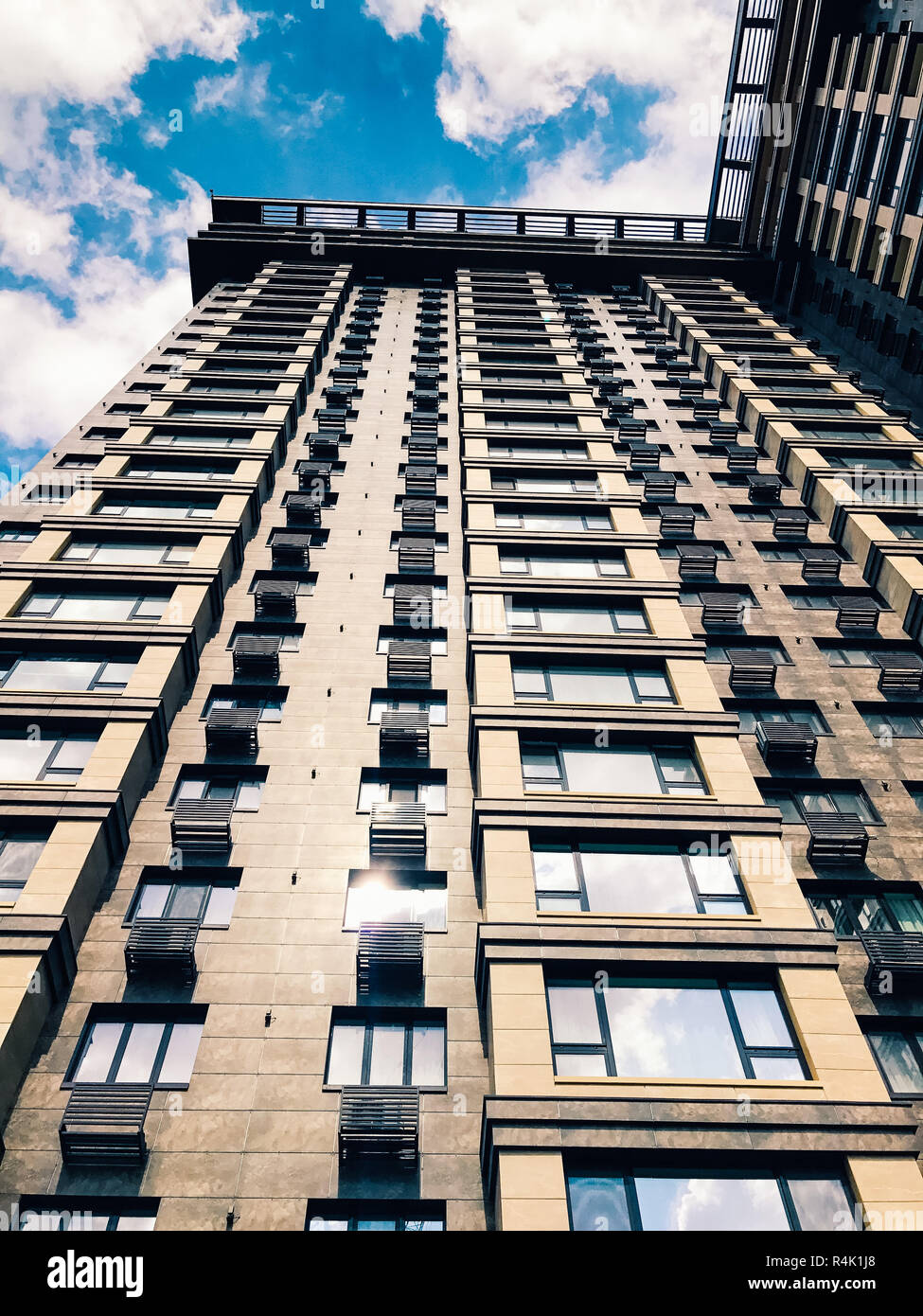 Top part of high-rise business building Stock Photo - Alamy