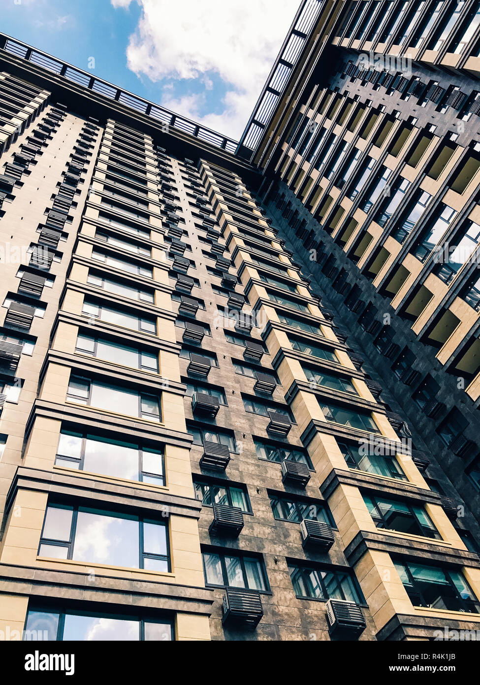 Top part of high-rise business building Stock Photo - Alamy