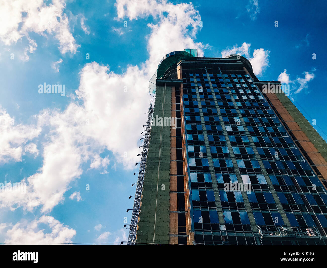 Top part of high-rise business building Stock Photo - Alamy