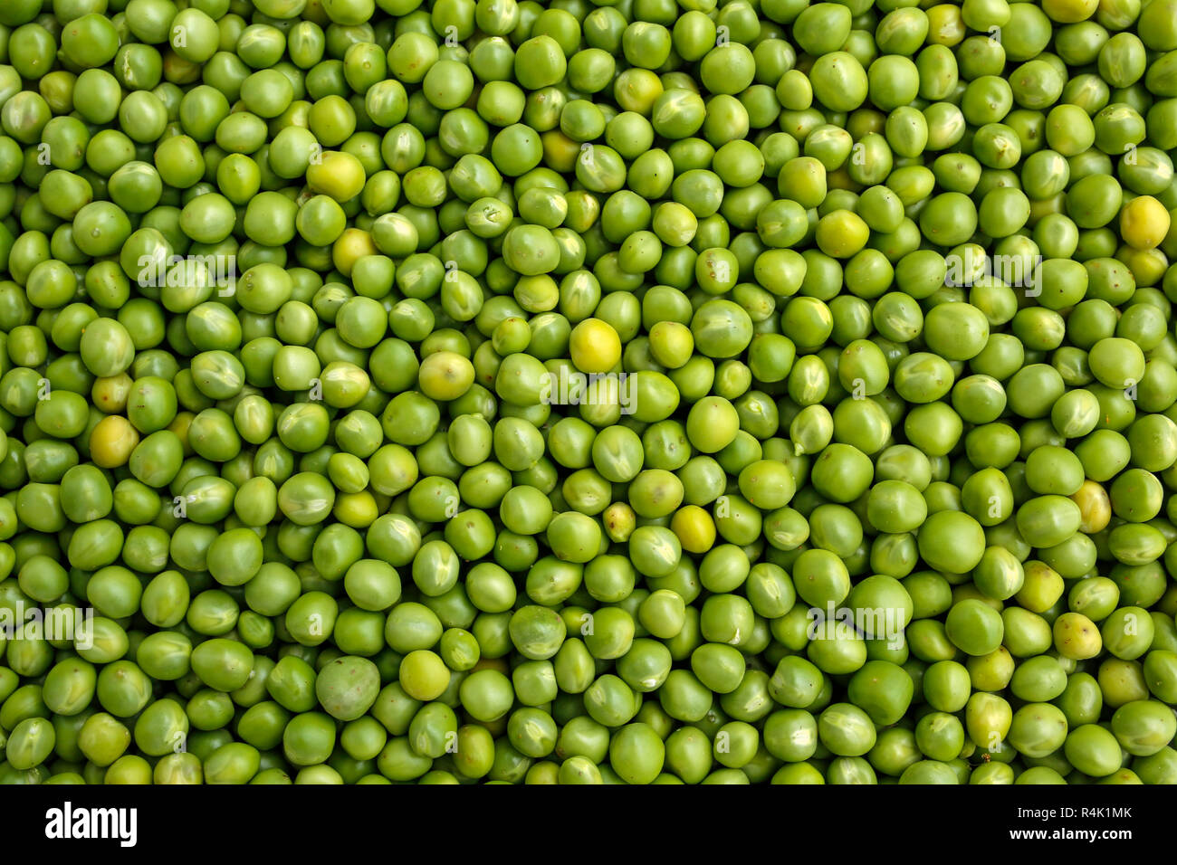 green peas background or texture Stock Photo - Alamy