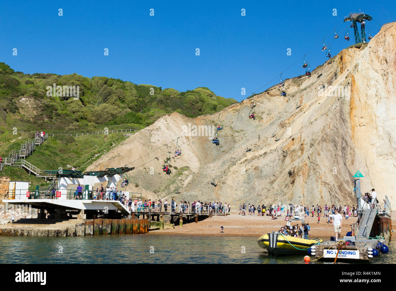 Famous multi coloured layered sands of the sandy cliffs of Alum Bay ...