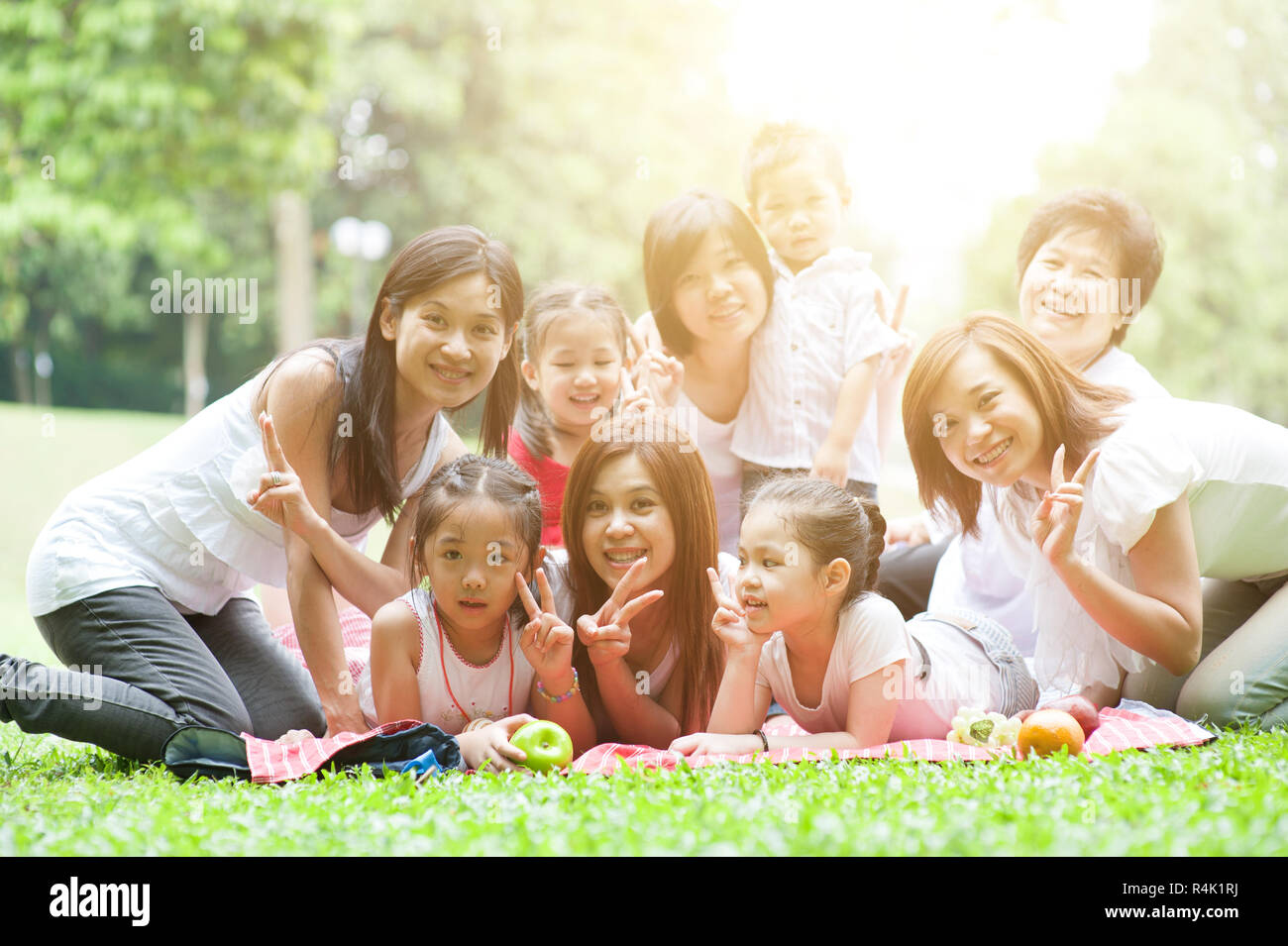 Asian multi generations family outdoors Stock Photo - Alamy