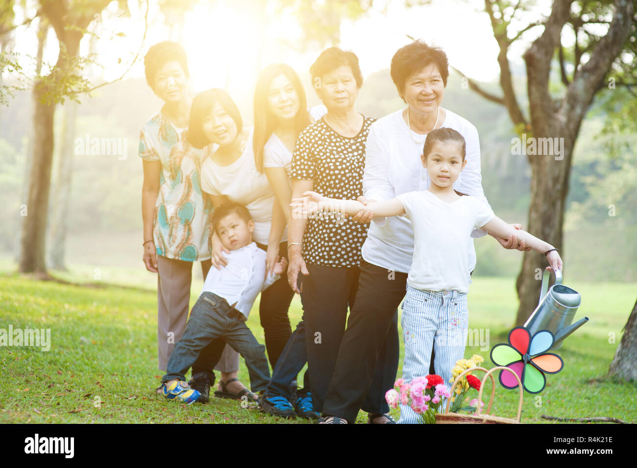 Big group of Asian multi generations family outdoors Stock Photo - Alamy