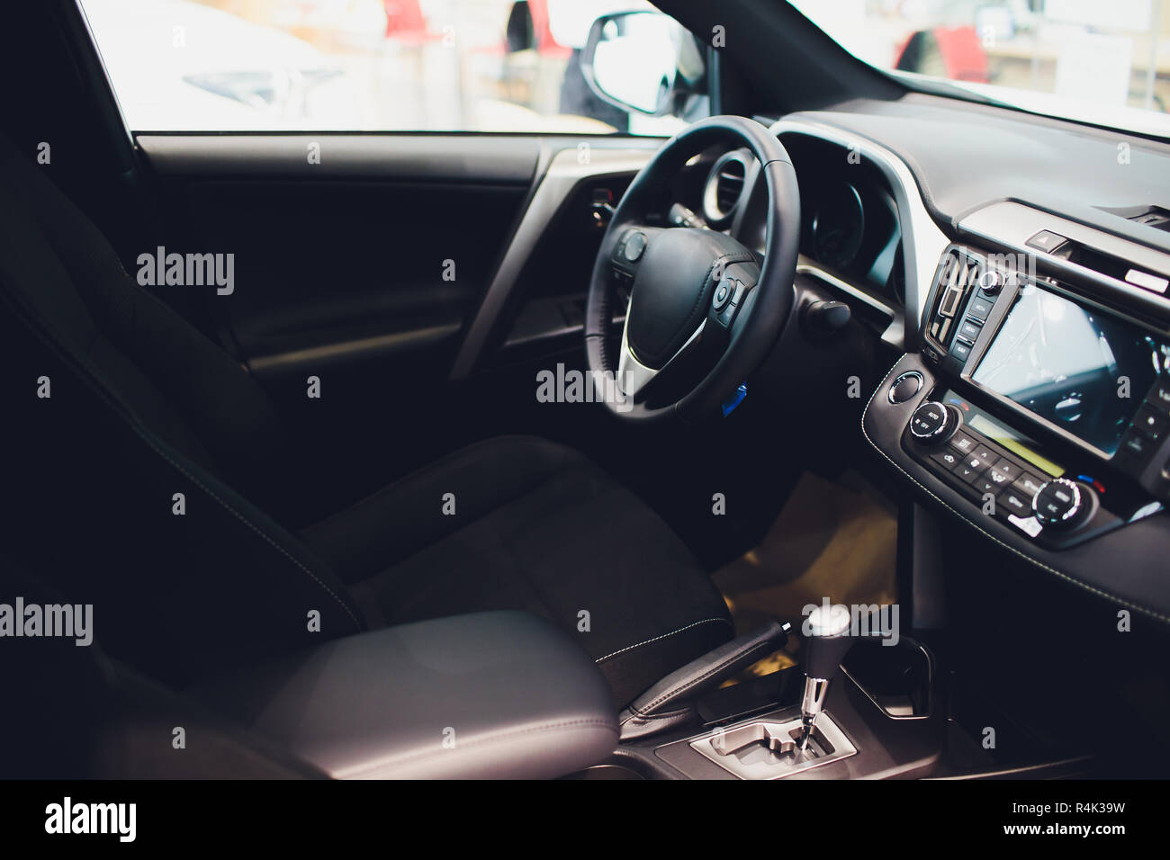 Leather upholstery inside the car modern interior Stock Photo - Alamy