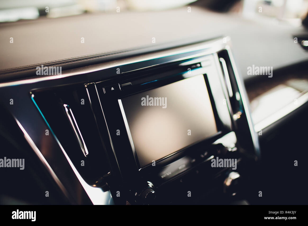 Transportation,technology and vehicle concept - man using car system ...