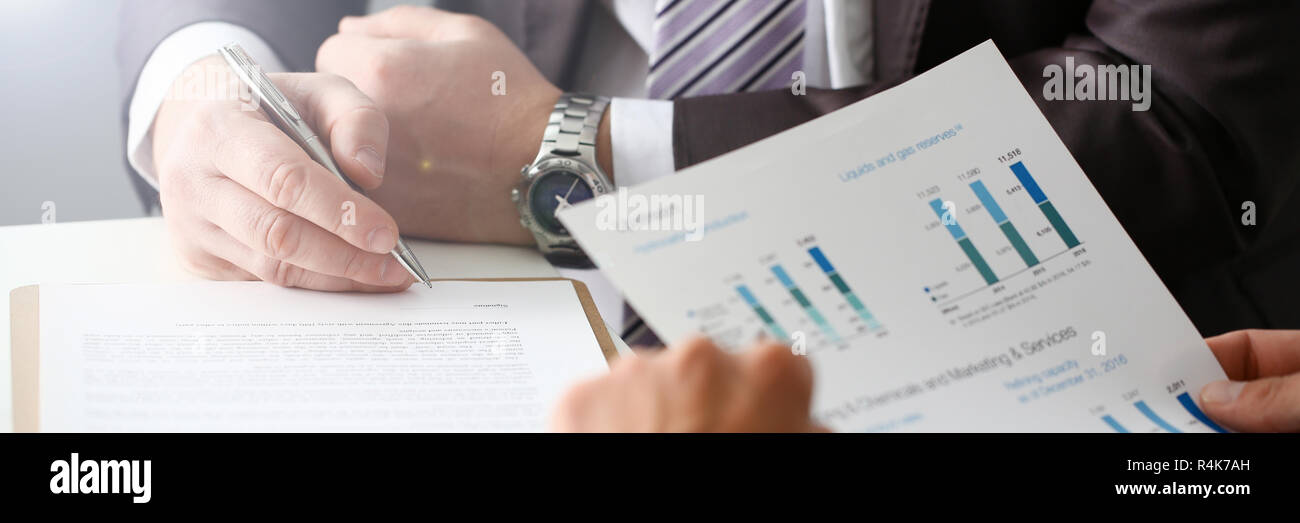 Male arm in suit and tie fill form clipped Stock Photo - Alamy