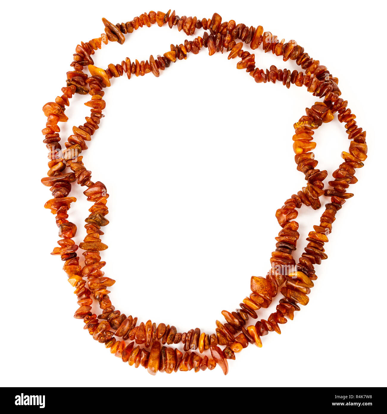 String of Baltic amber beads isolated on white background. Bright ...