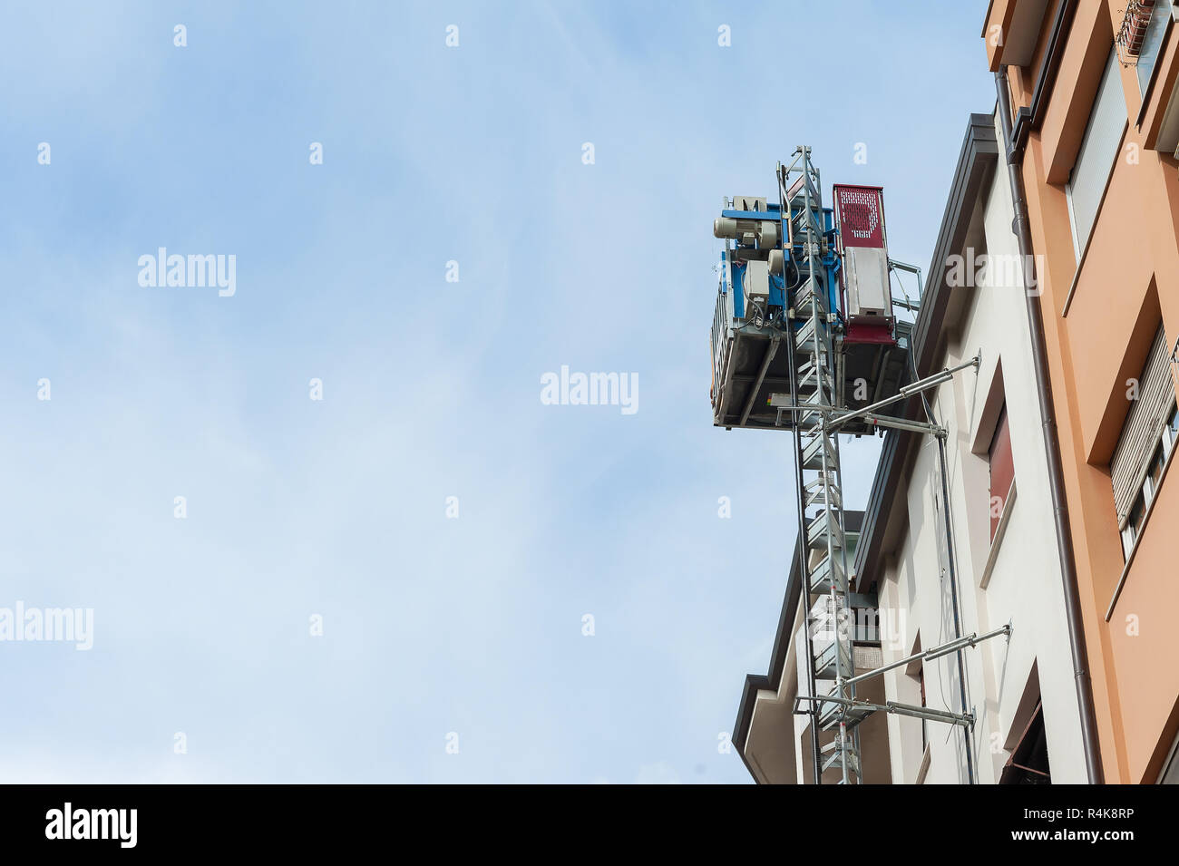 Elevator construction attached to the wall Stock Photo - Alamy