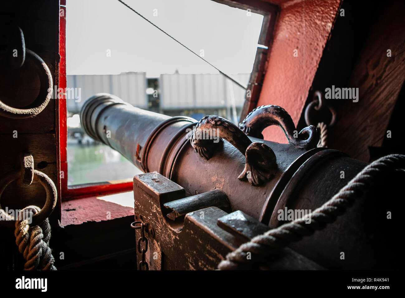 Ancient military galleon ship with round shot cannons. Iron cannon gun ...
