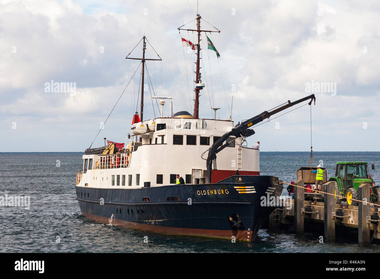 Unloading crates of luggage hi-res stock photography and images - Alamy