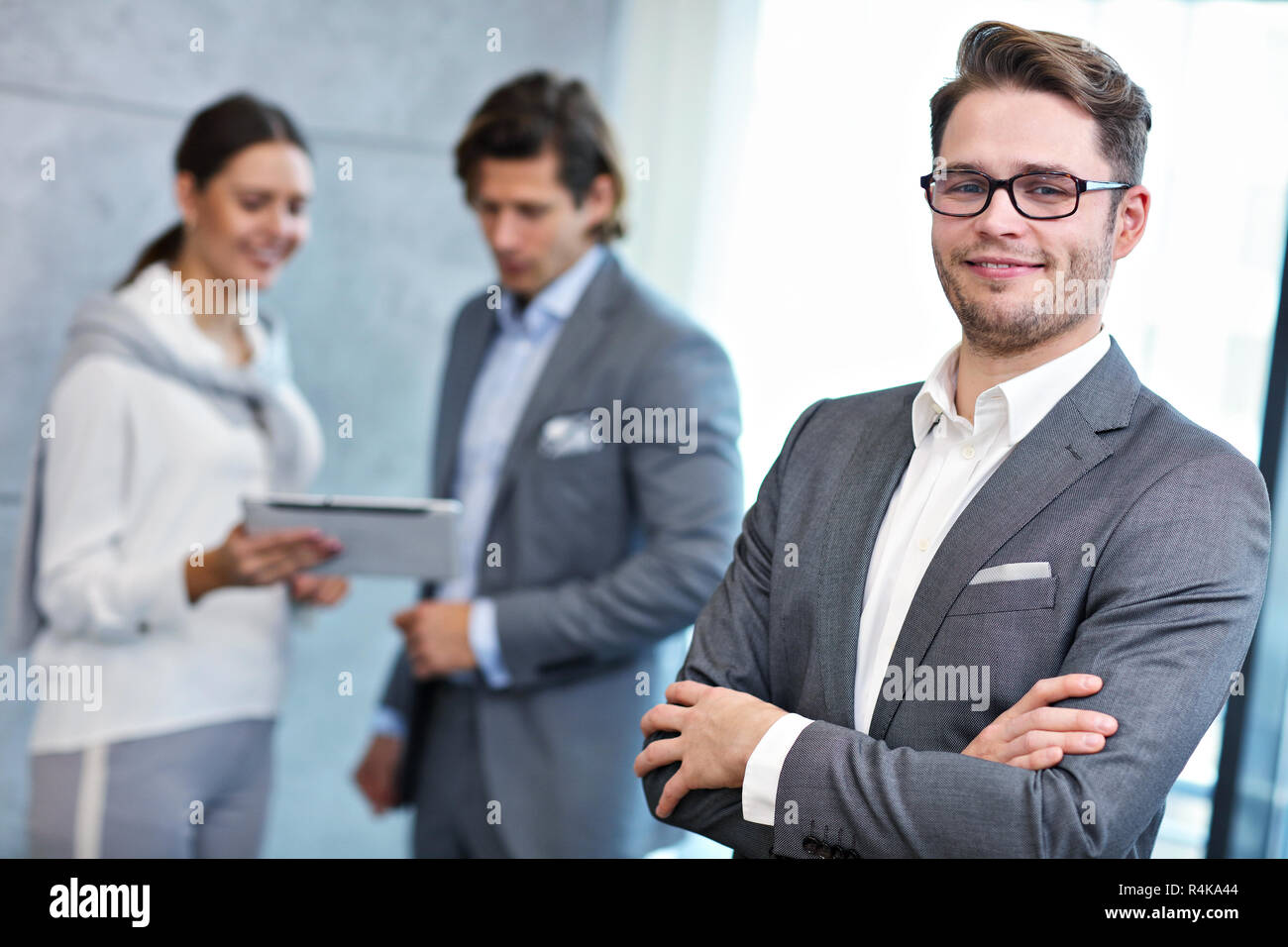 Group of business people sharing their ideas Stock Photo - Alamy