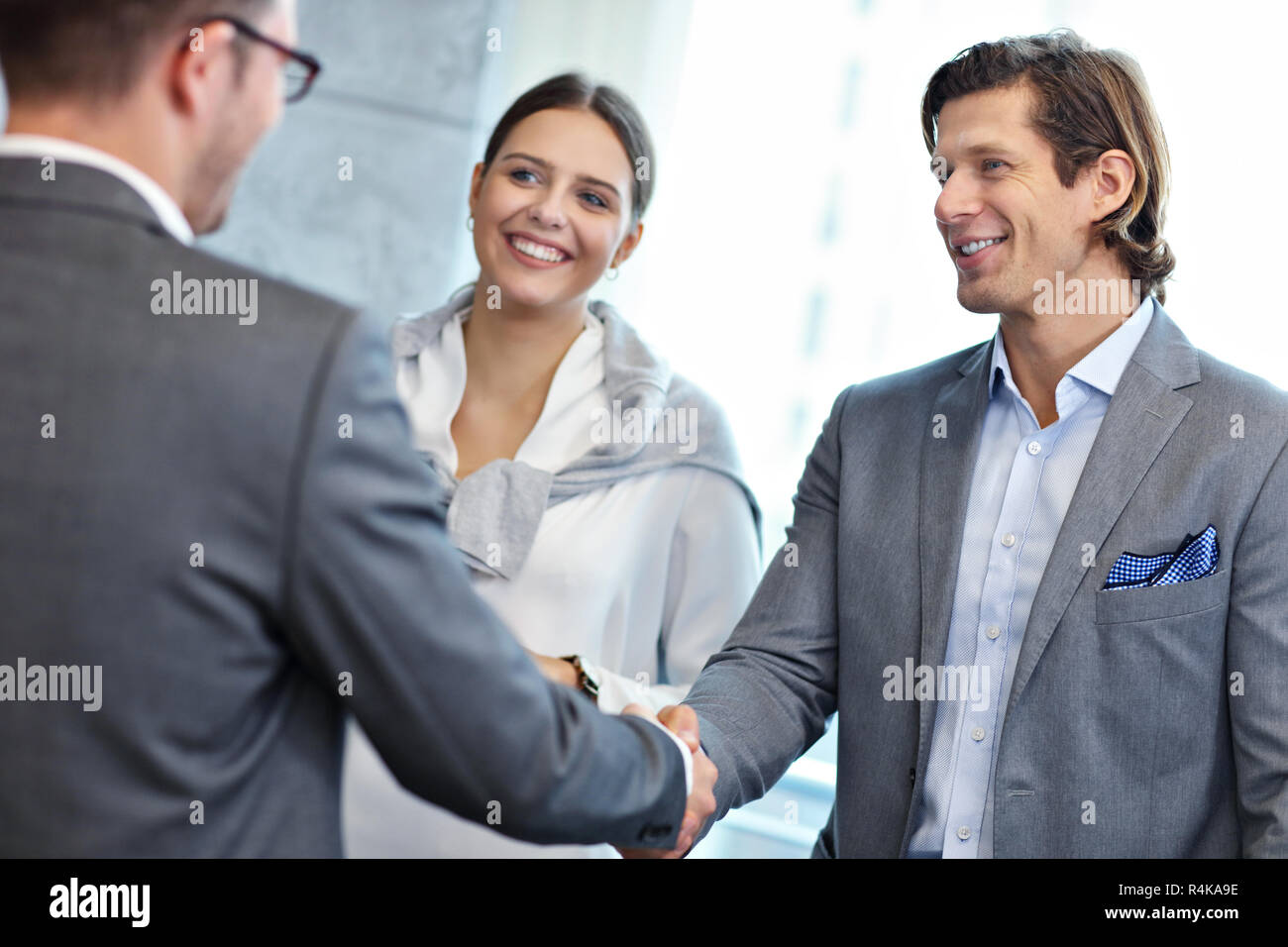 Group of business people introducing one another Stock Photo - Alamy