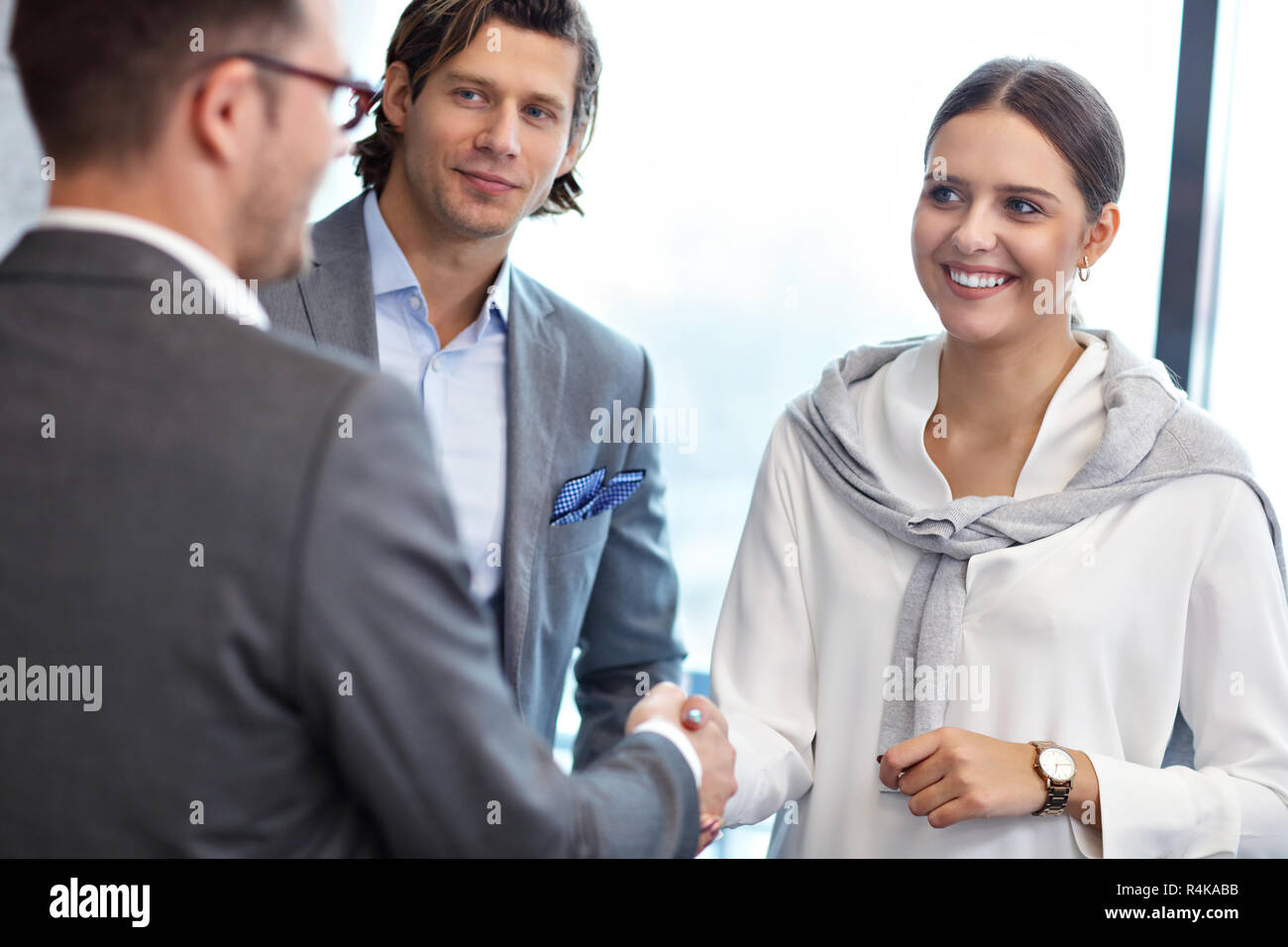 Group of business people introducing one another Stock Photo - Alamy