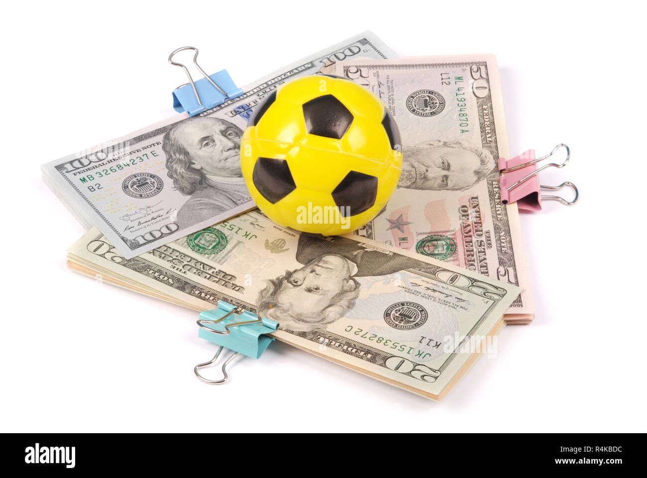 Yellow soccer ball on money. Abstract money background isolated on ...