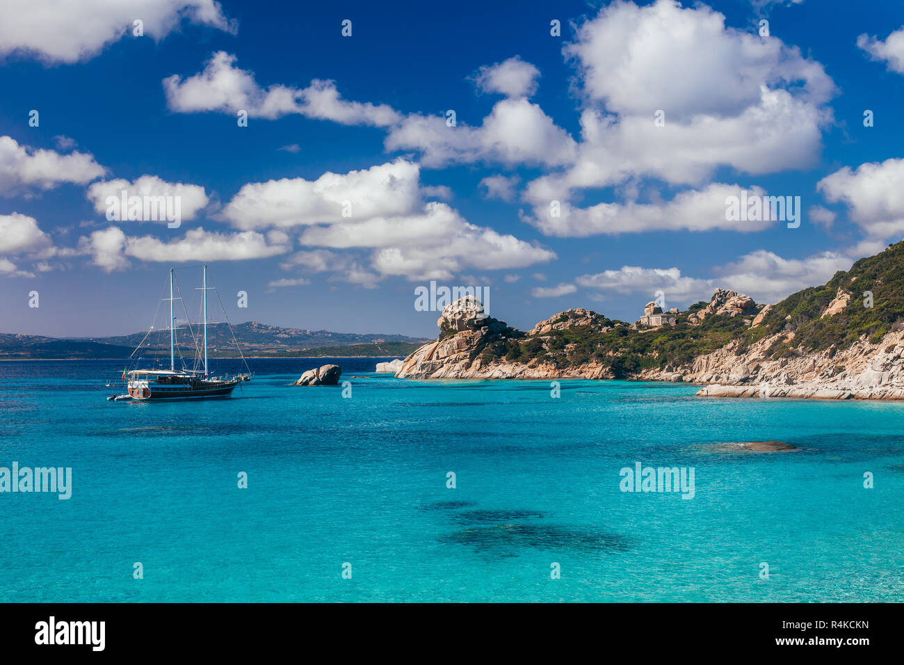 Amazing azure clear sea water with yacht in Sardinia island, Italy ...