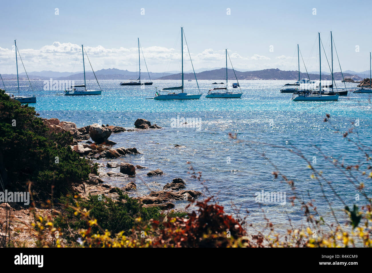 Luxury yachts at the amazing coast of mediterranean sea in Sardinia ...